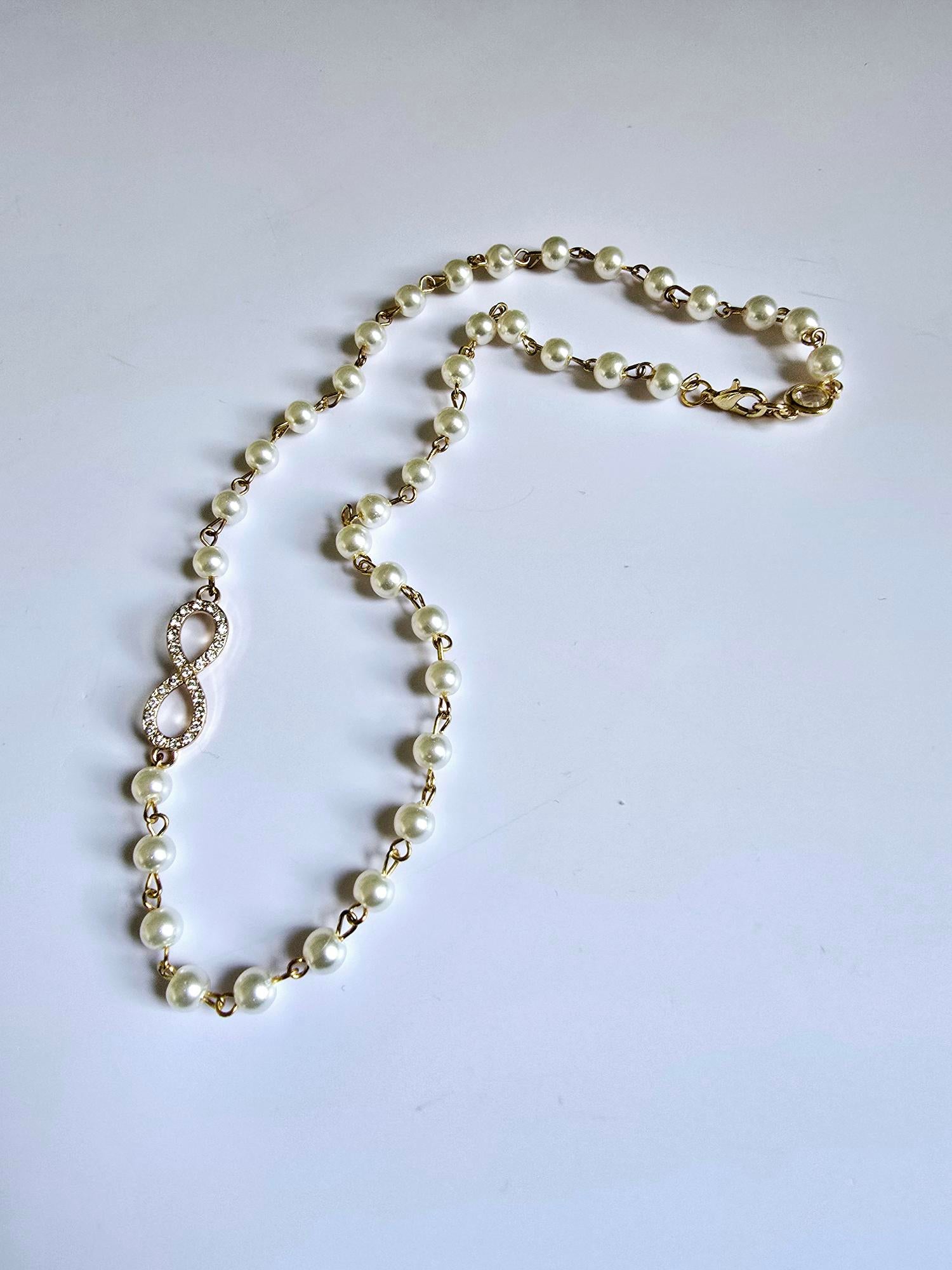 Gold-Inspired Pearl Necklace Featuring an Infinity Sparkling Pendant ...